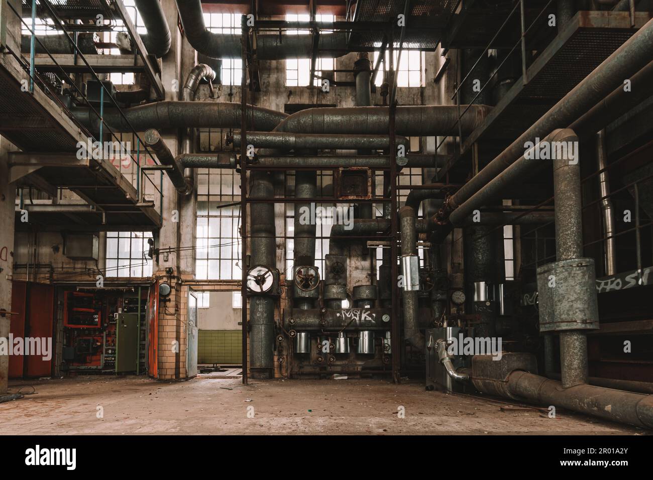 Old and rusty abandoned industrial plant, forgotten historical factory ...