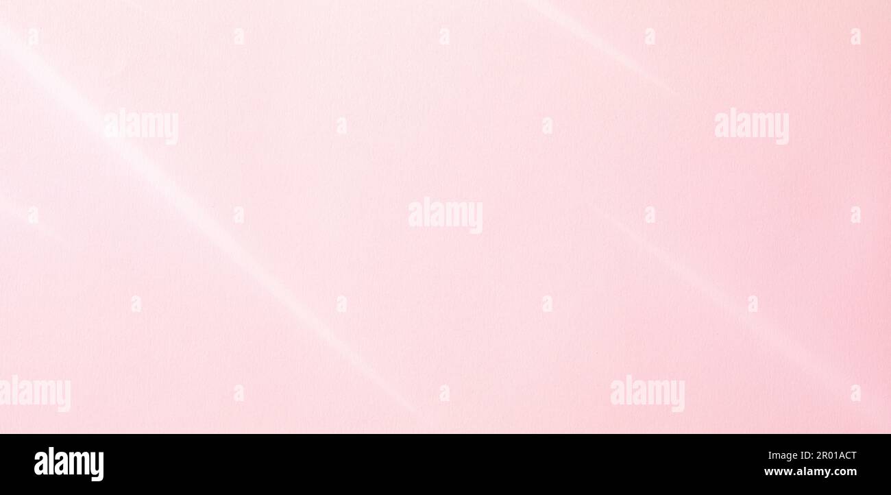 Pink paper texture background with sunbeams on it Stock Photo - Alamy