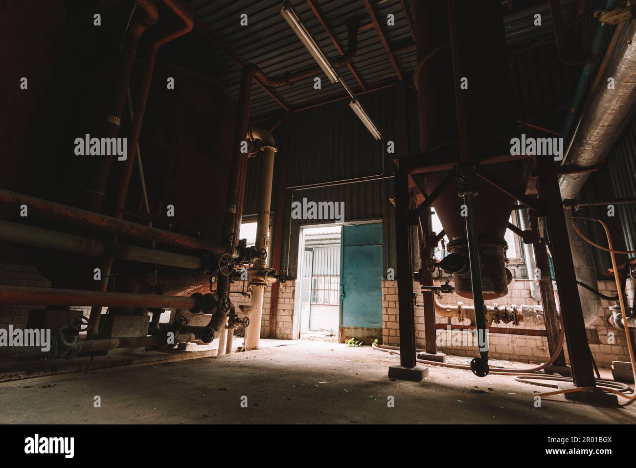 Old and rusty abandoned industrial plant, forgotten historical factory ...