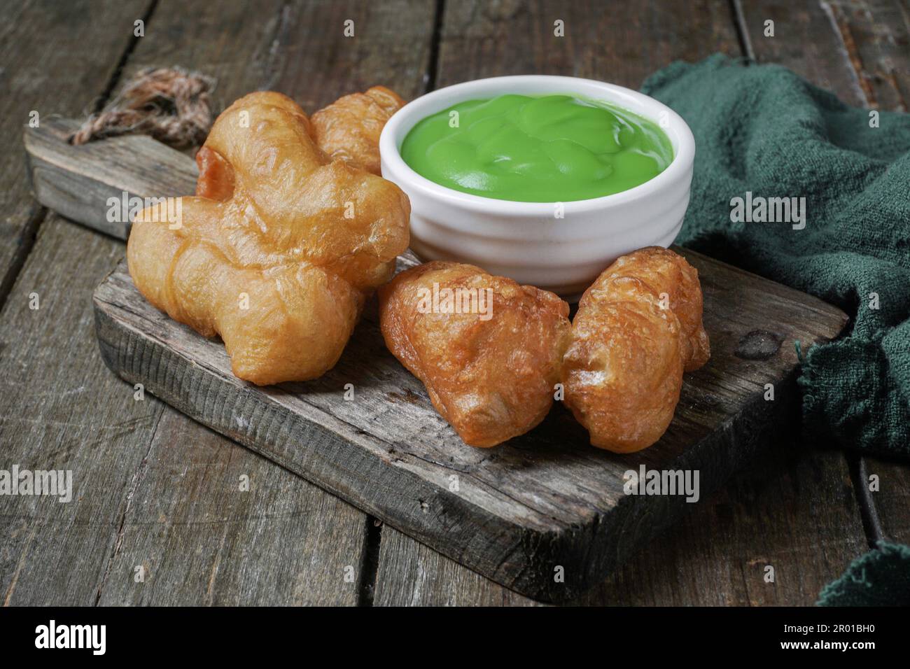 Youtiao or baby cakoi breadstick bun Stock Photo - Alamy
