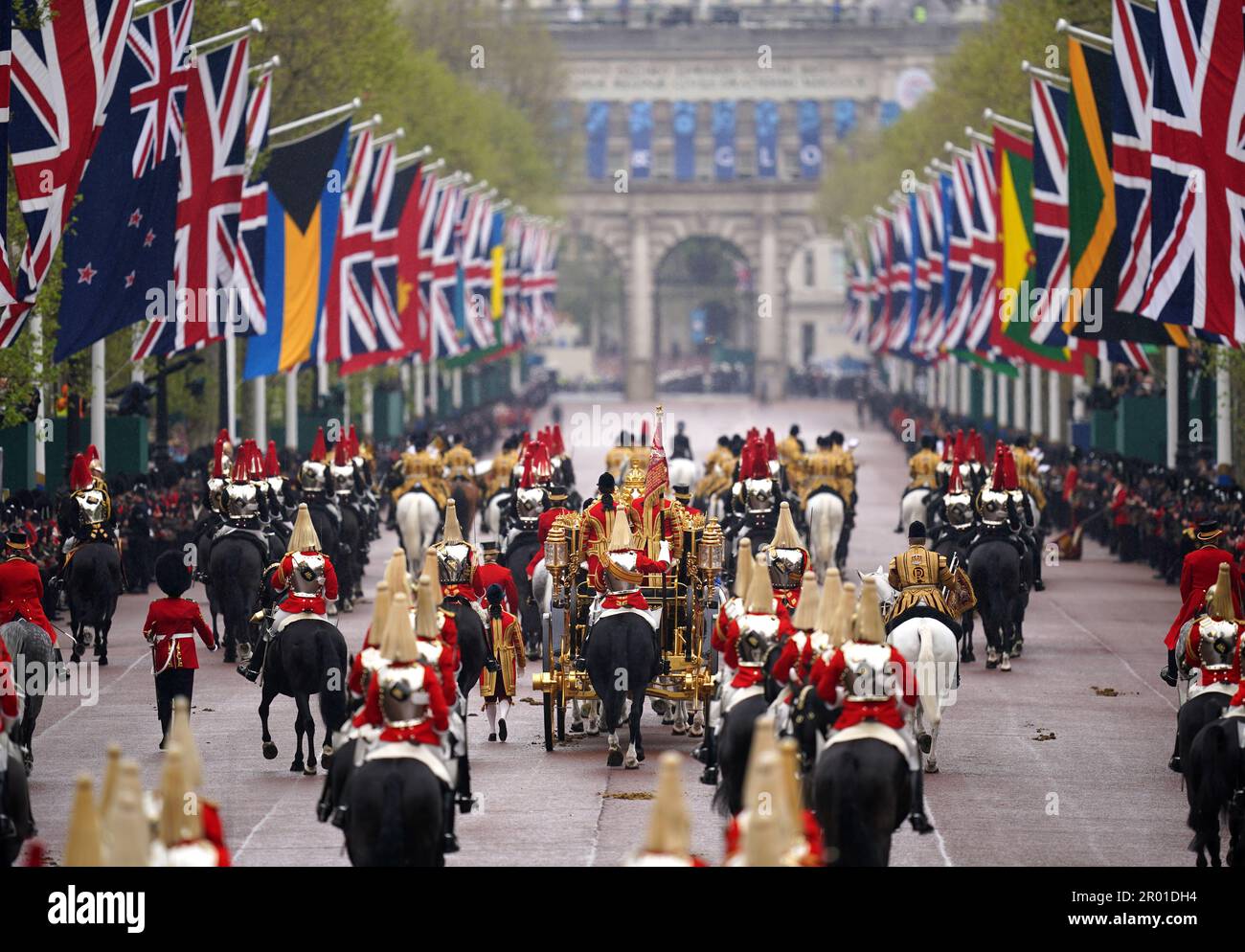 The Diamond Jubilee State Coach, accompanied by the Sovereign's Escort ...