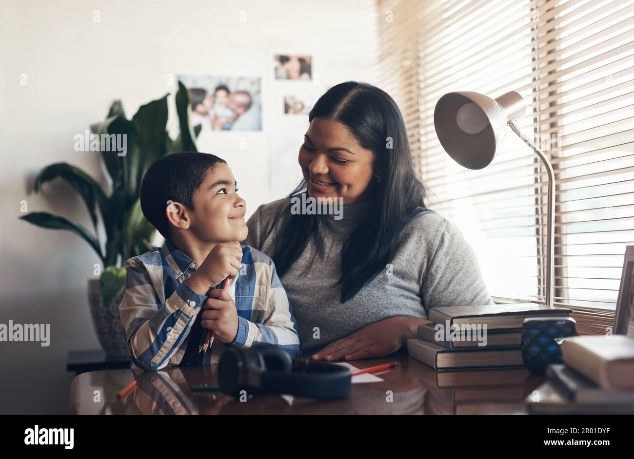 Youre my best teacher ever, mom. an adorable little boy completing a ...
