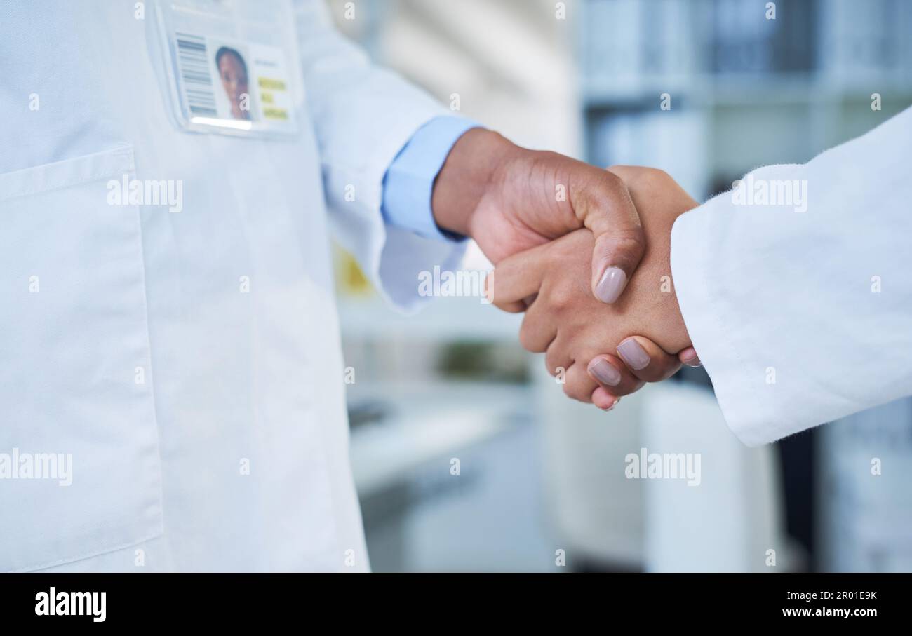 The world of science welcomes you. two unrecognisable scientists ...