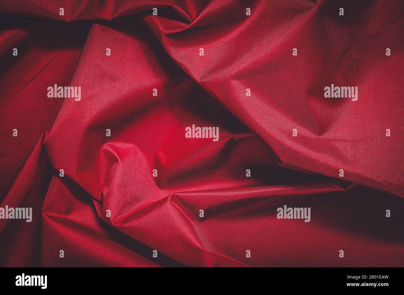 Red wrinkled fabric texture. Close-up of textile structure, may be used ...