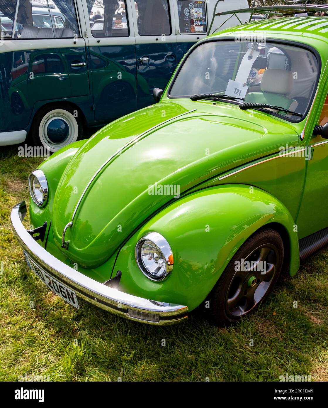Close up of the front end including bonnet, headlights, grille and ...