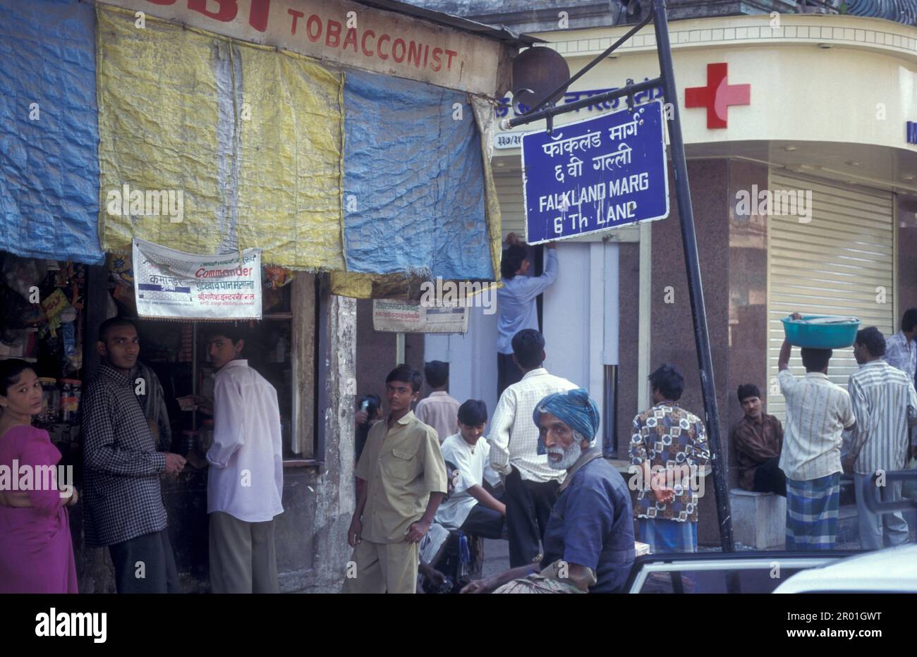 a marketstreet with shops and People in the city centre of Mumbai in ...