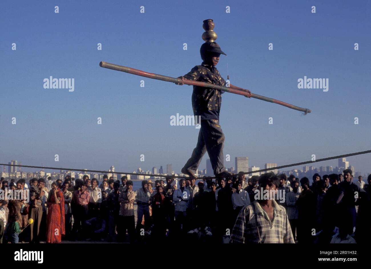 a Jester and artist at the Chowpatty Beach in the city centre of Mumbai ...