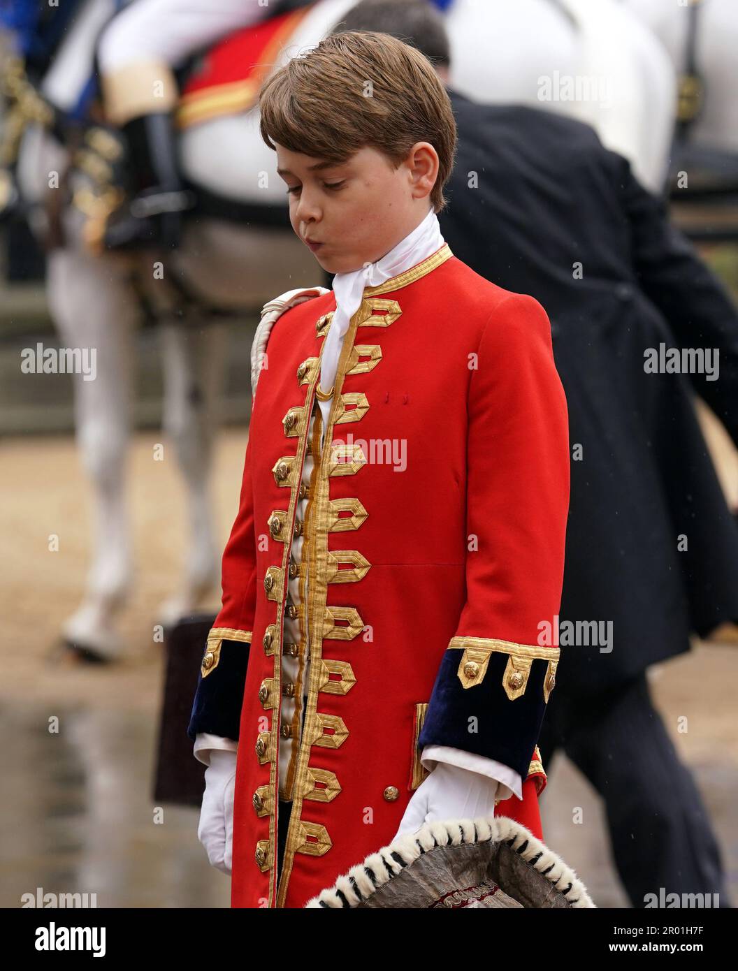 Prince George, one of four Pages of Honour, arriving at Westminster ...