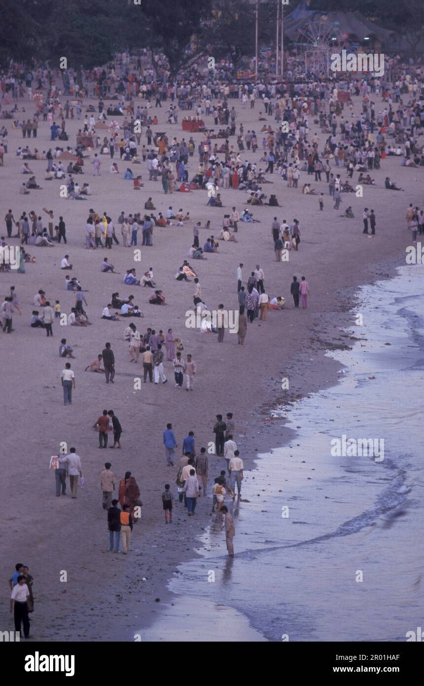 people at the Chowpatta Beach in the city centre of Mumbai in India ...