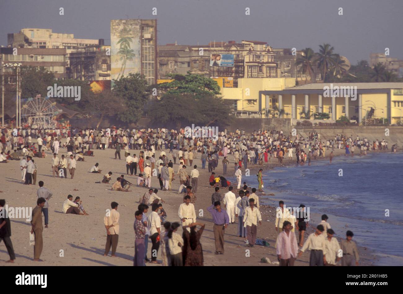 people at the Chowpatta Beach in the city centre of Mumbai in India ...