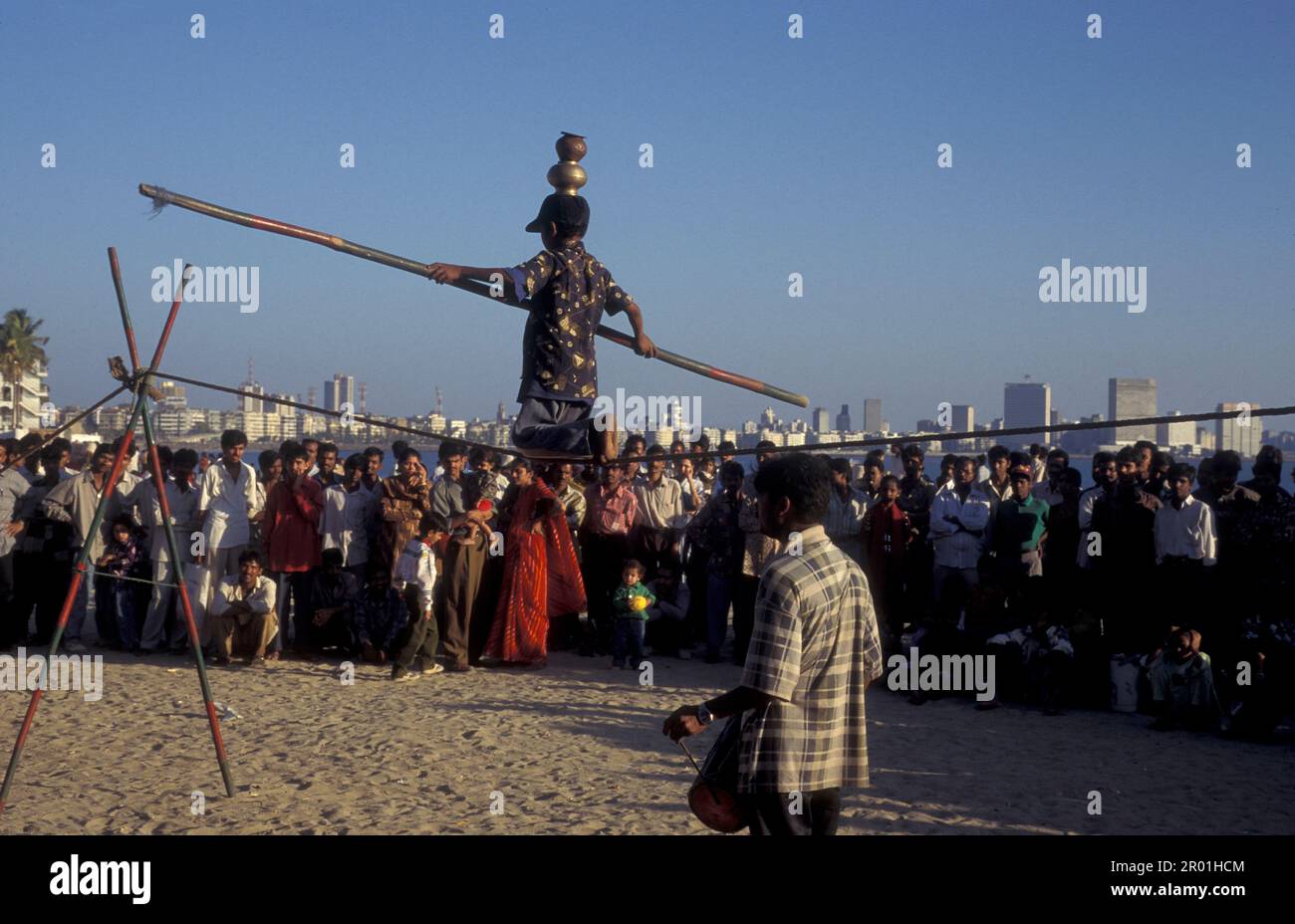 a Jester and artist at the Chowpatty Beach in the city centre of Mumbai ...