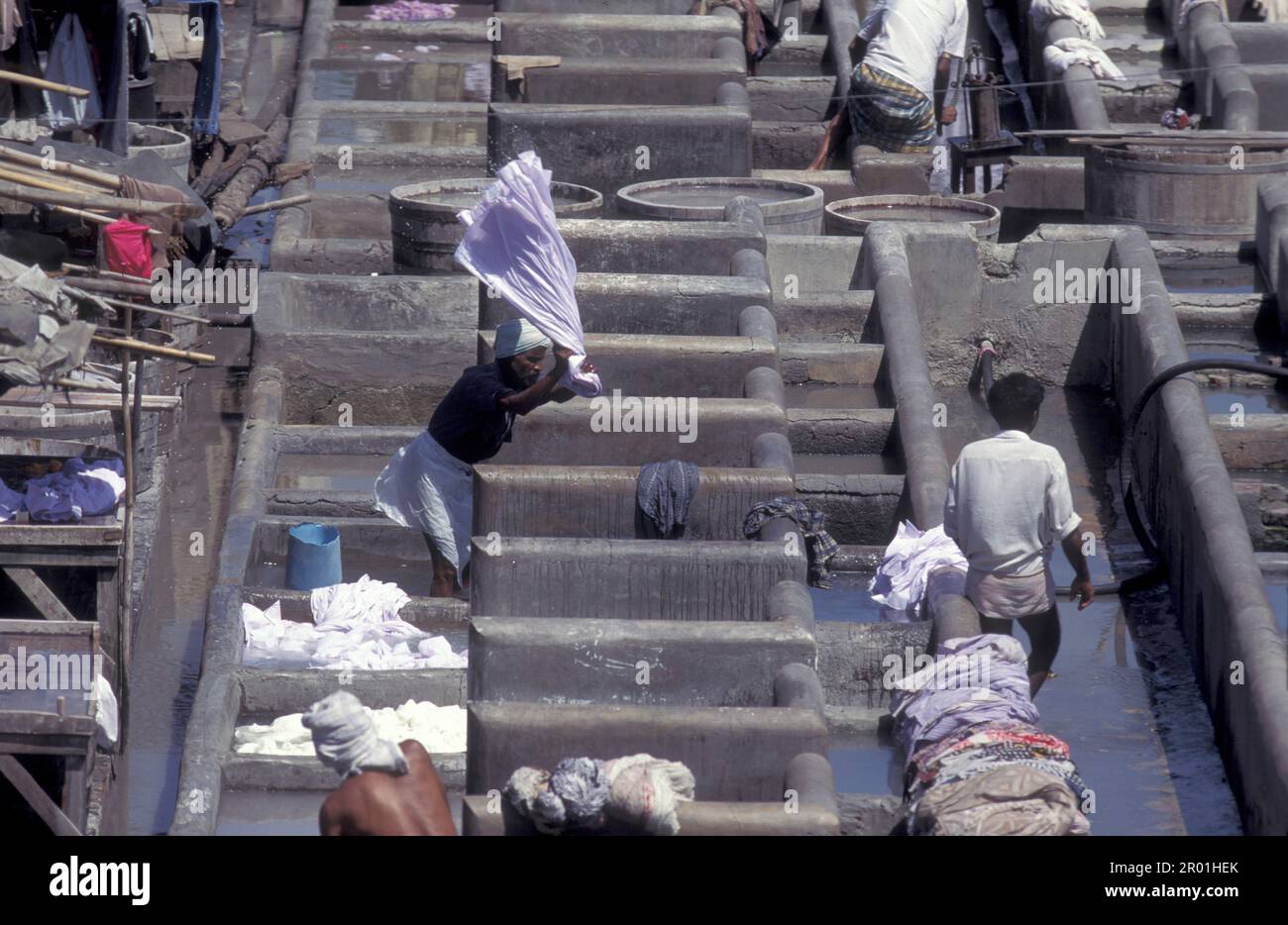 workers at the outdoor Laundry Dhobi Ghat at Mahalaxmi in the city ...