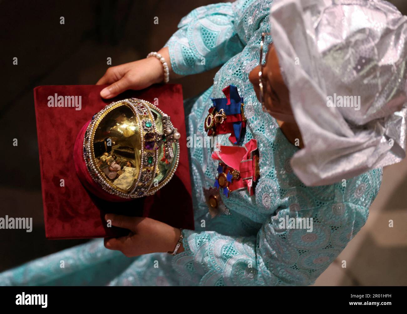 The Sovereign's Orb is carried on a cushion at the coronation of King ...