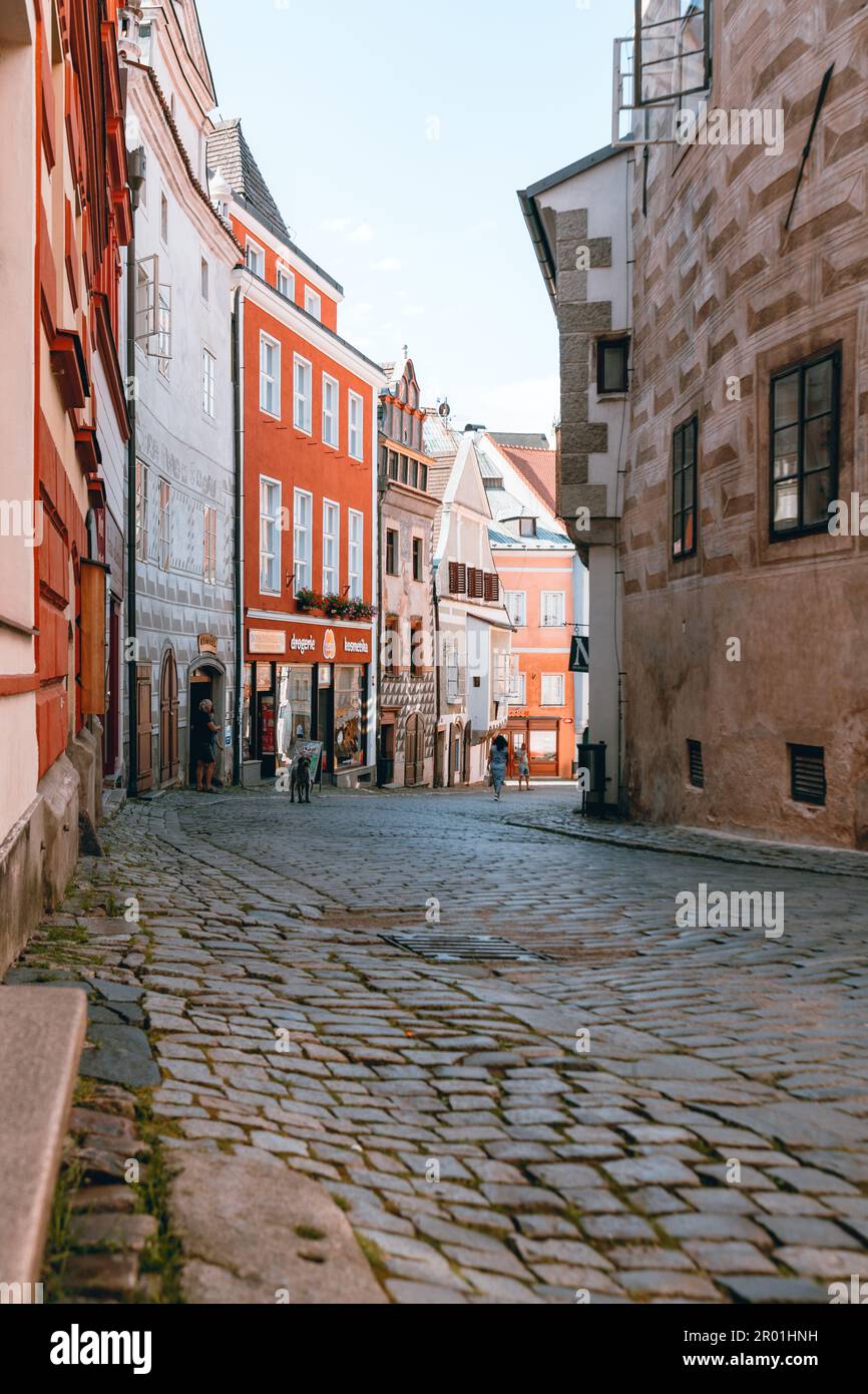 Cobble stone street ist lined with colorful buildings. It is a wuiet ...