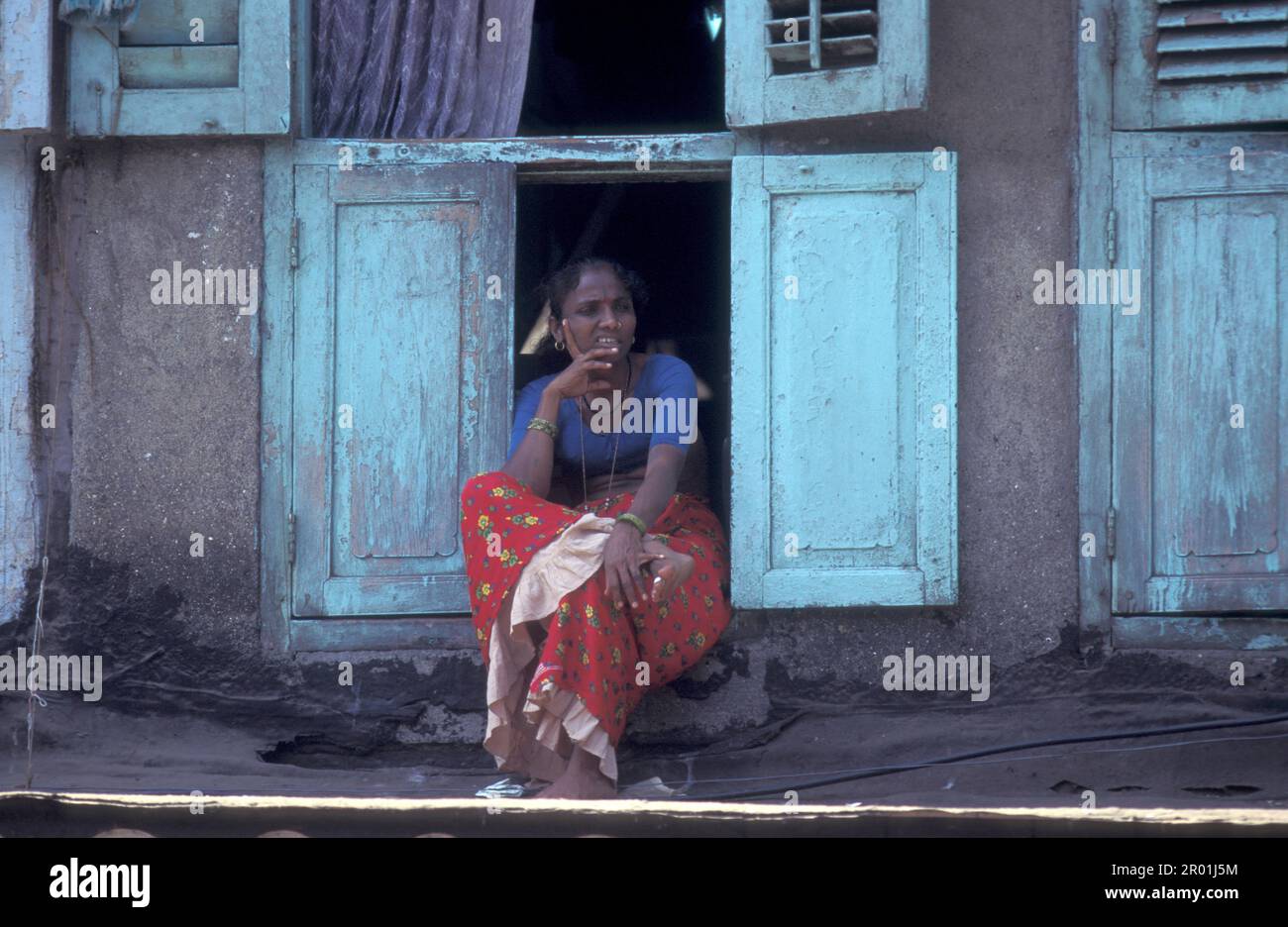 a Prostitute women in front of her Room at the Falkland road in the ...