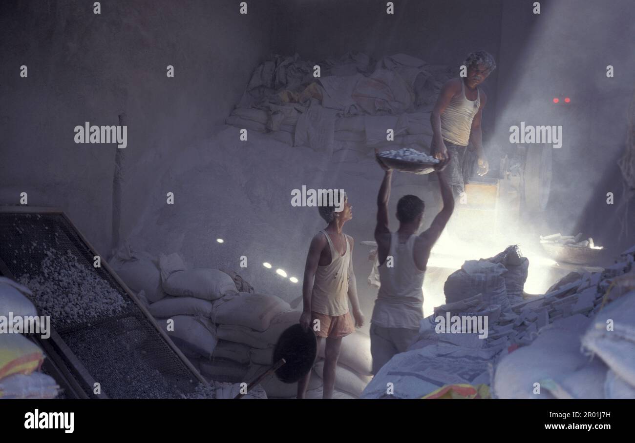 a stone and sand factory in a fabric house at a village of a slum in ...