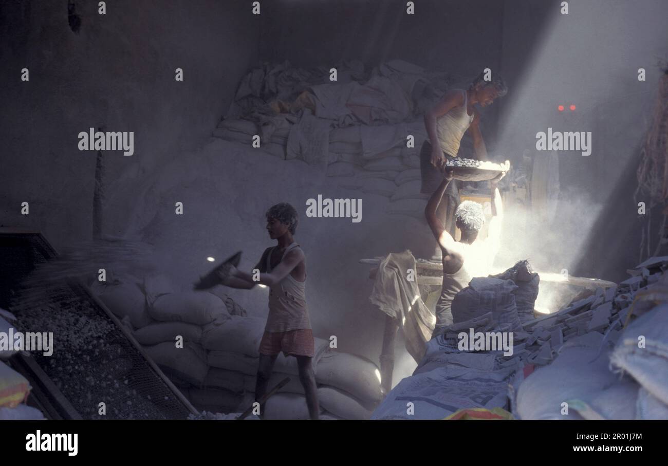 a stone and sand factory in a fabric house at a village of a slum in ...