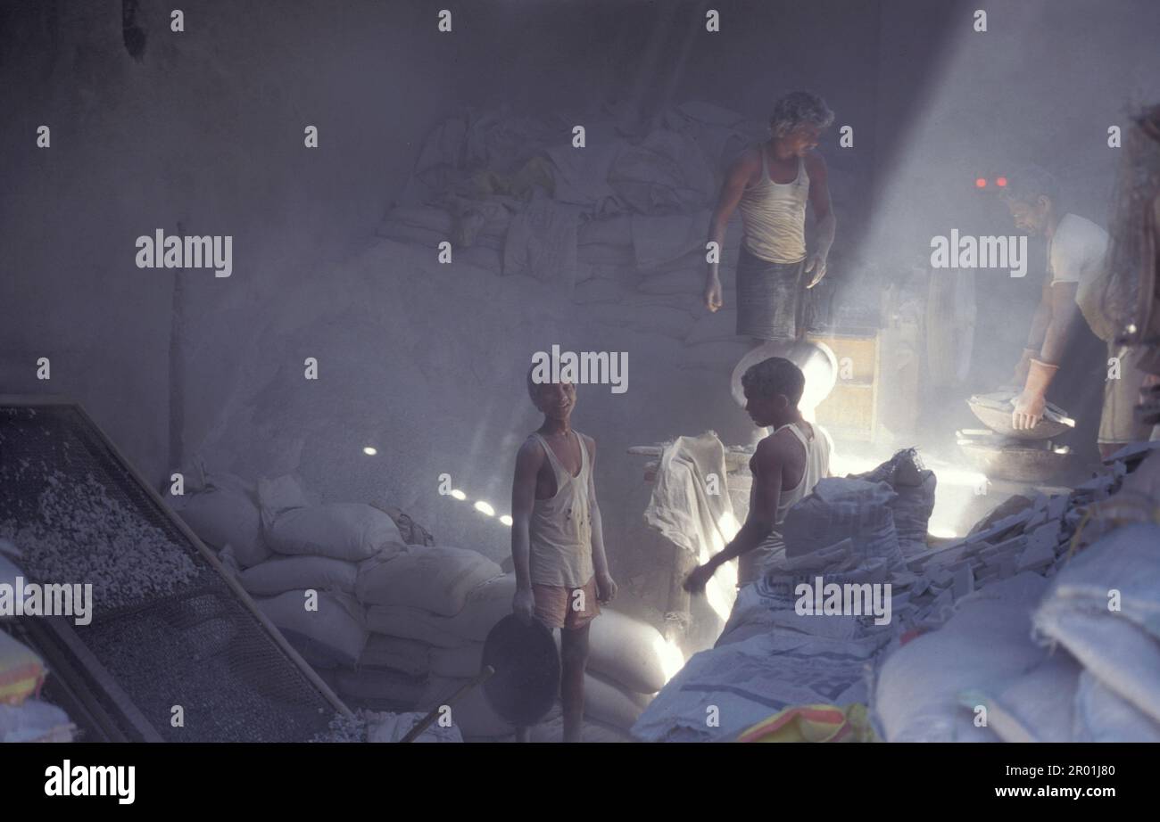 a stone and sand factory in a fabric house at a village of a slum in ...