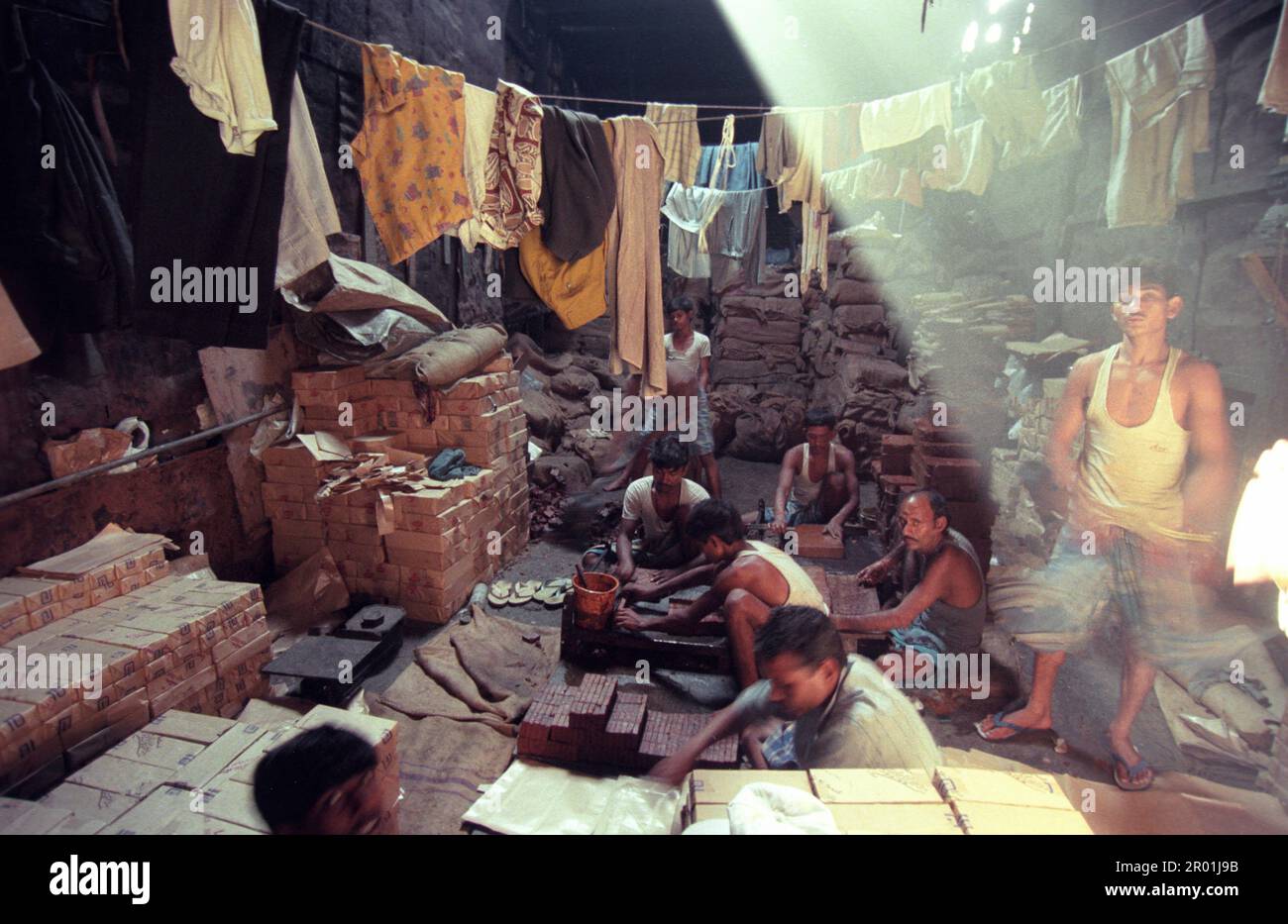 a stone and brick factory in a fabric house at a village of a slum in ...