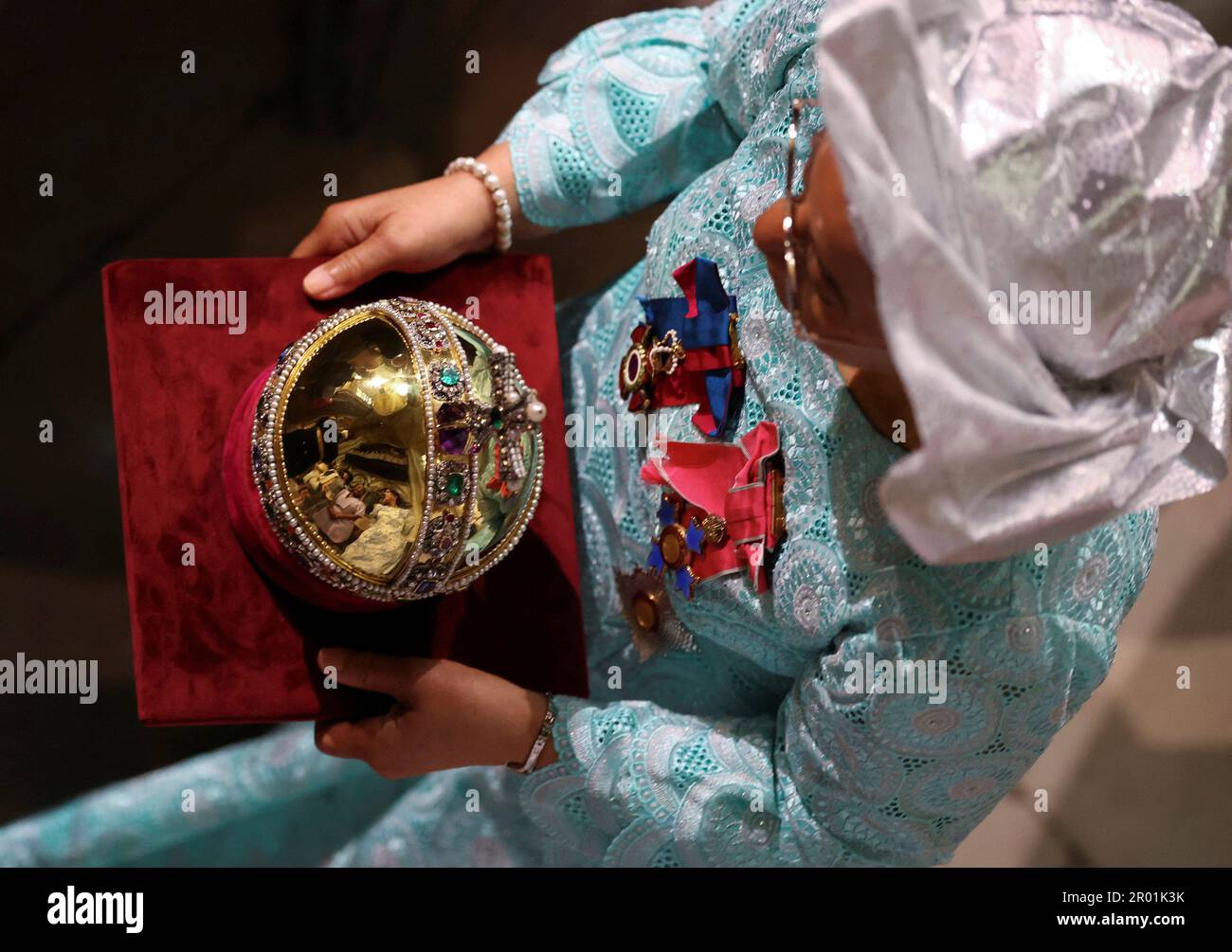 The Orb is carried for Britain's King Charles III and Queen Consort ...