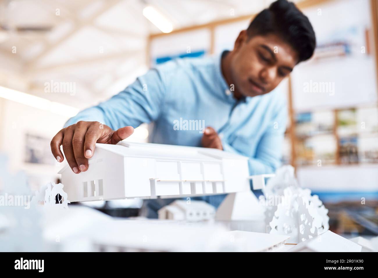 Designing a building thats practical and pleasing to the eye. a young ...