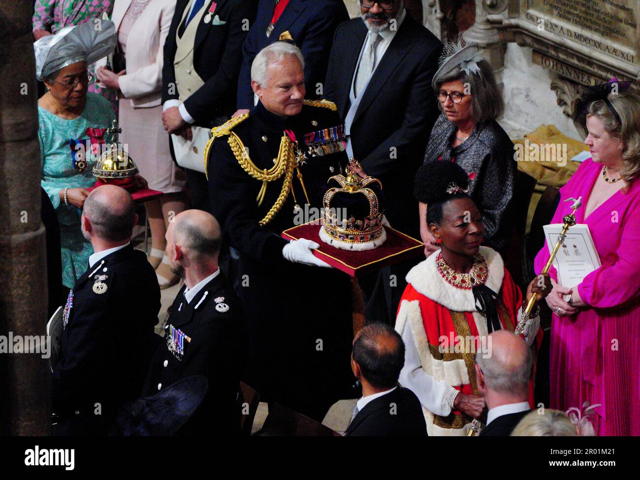 (right to left) Baroness Floella Benjamin, carrying the The Sovereign’s ...