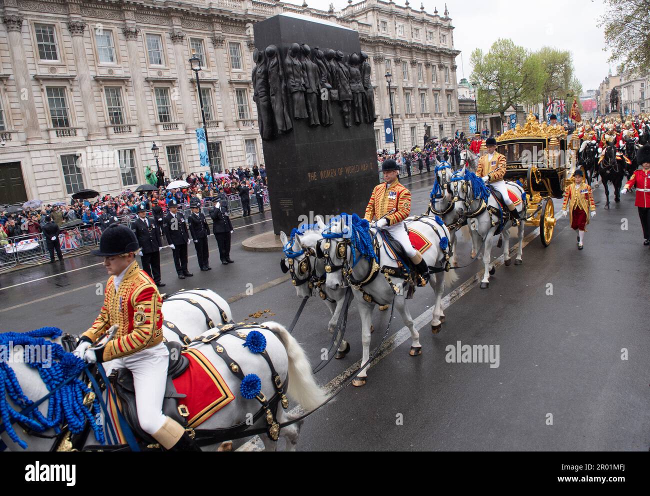 King Charles III and Queen Camilla are carried in the Diamond Jubilee State Coach as the King's ...
