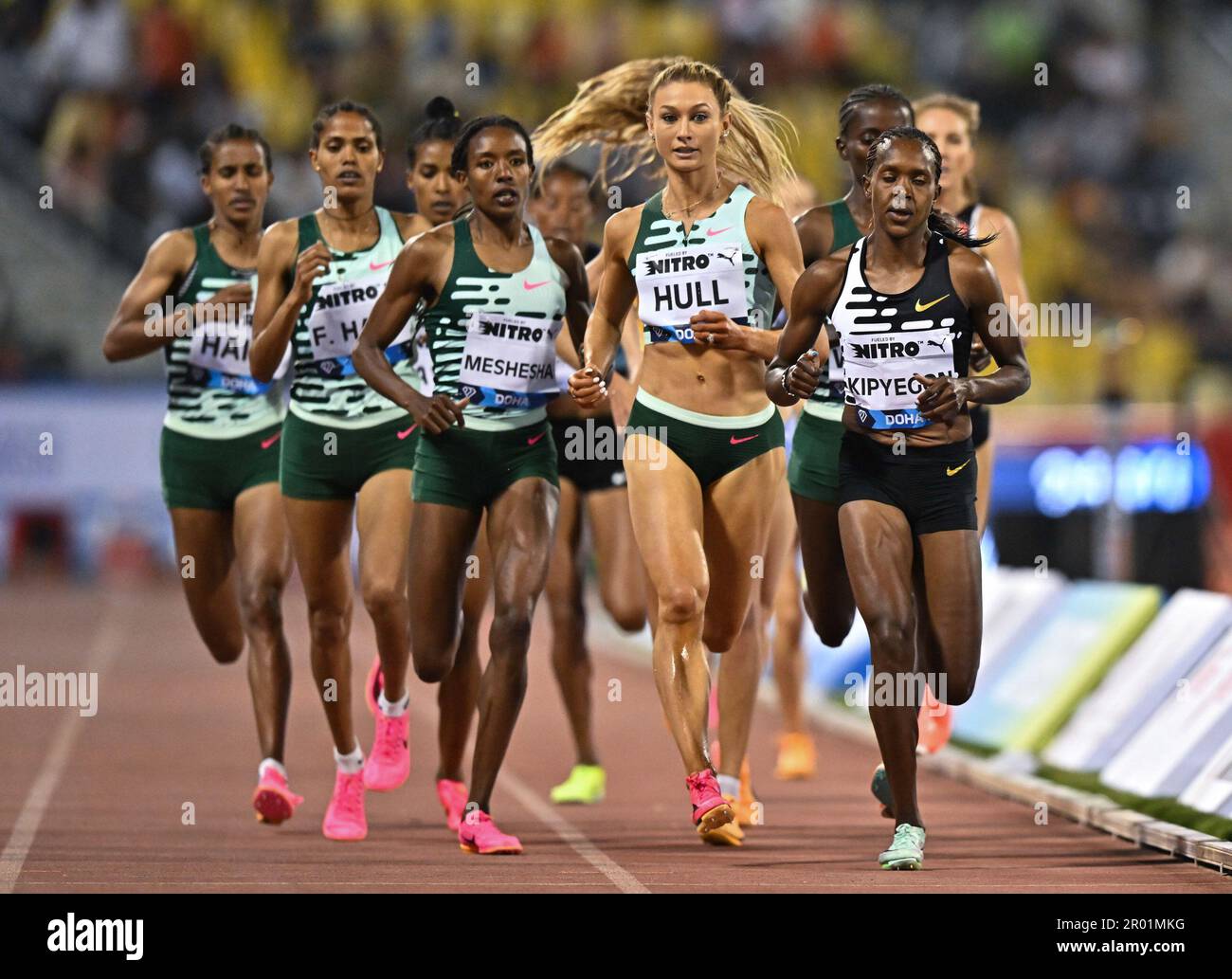 Doha, Qatar. 5th May, 2023. Faith Kipyegon (1st R) of Kenya competes ...