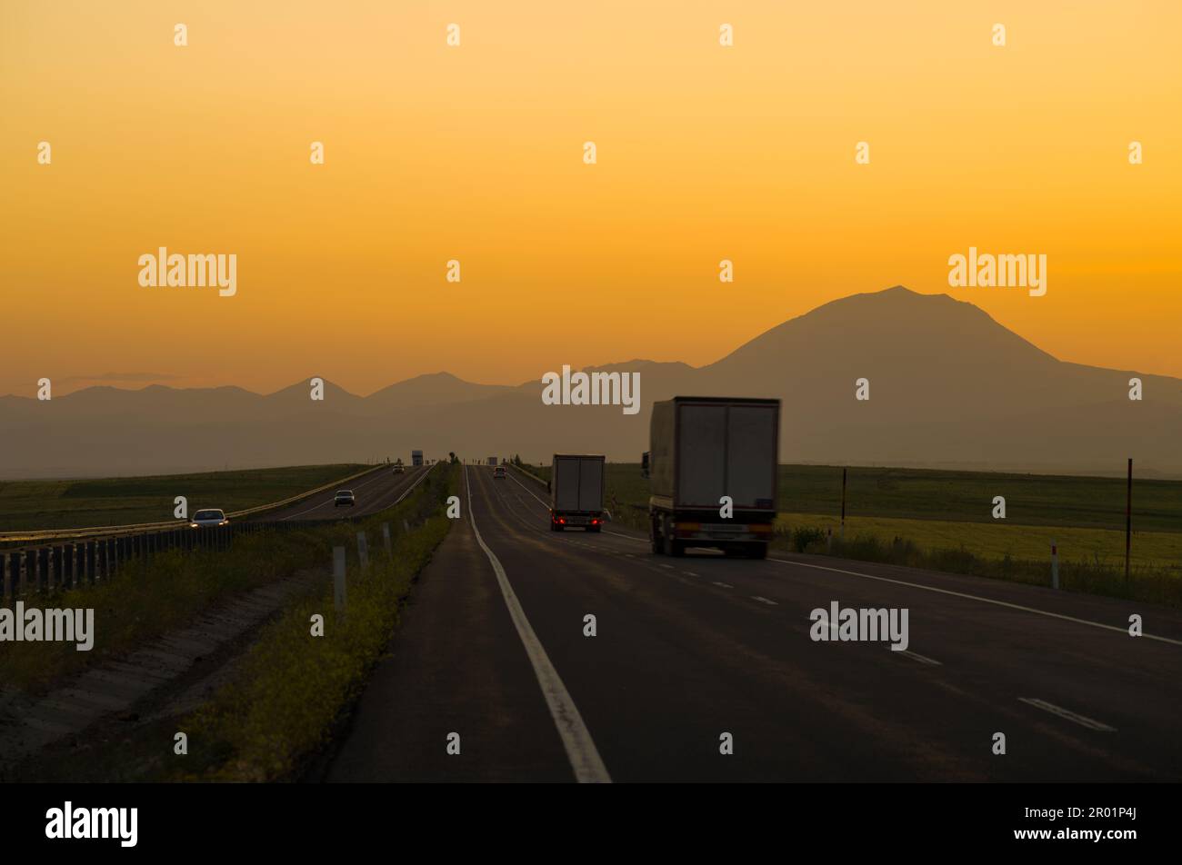 Asphalt road in the countryside. Turkish highways at sunset Stock Photo ...