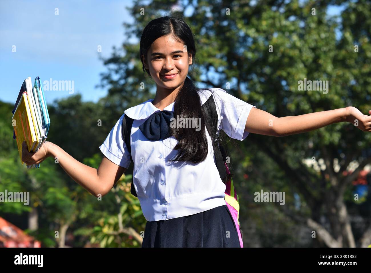Girl Student And Happiness Wearing Uniform Stock Photo - Alamy