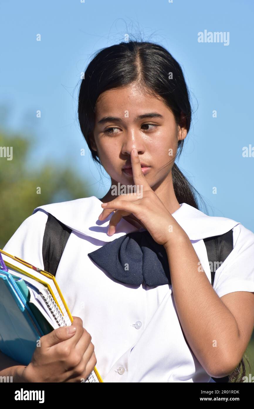 School Girl And Silence Wearing Uniform Stock Photo - Alamy