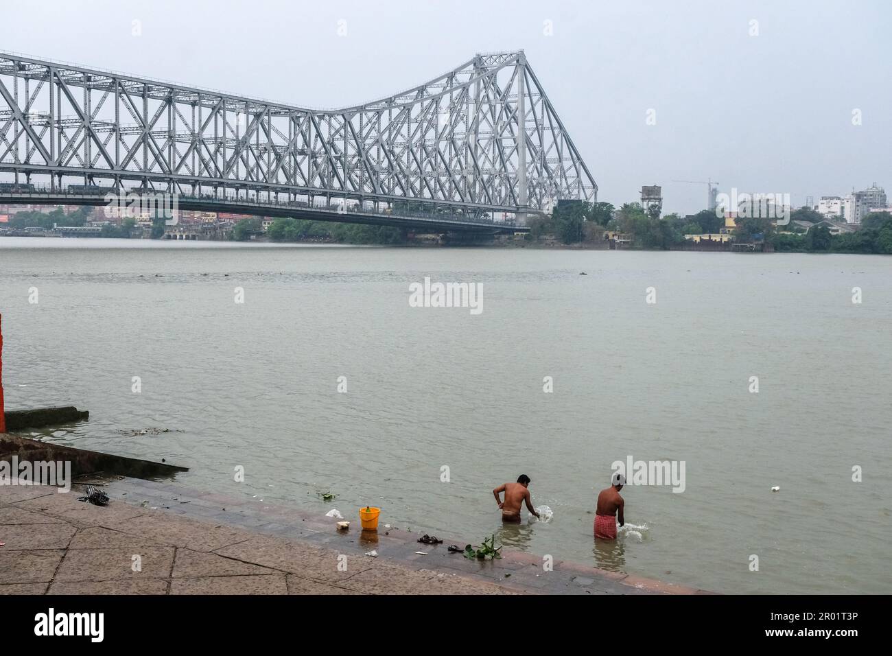 People take baths at the holy river Ganga Ghat in North Kolkata. (Photo ...
