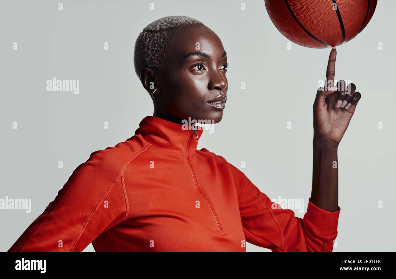 The day isnt complete without a bit of basketball. Studio shot of an ...