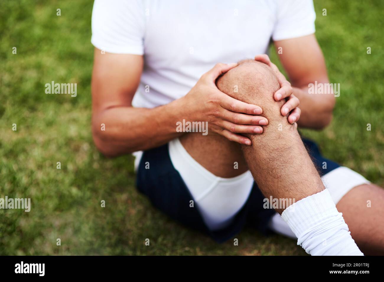 Injuring her knee hi-res stock photography and images - Alamy