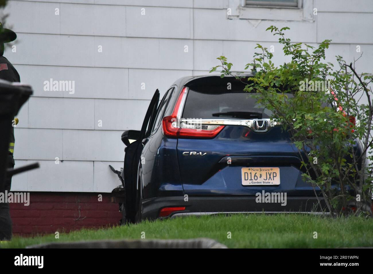 View of a vehicle that struck the house on Hopper Street. A vehicle ...