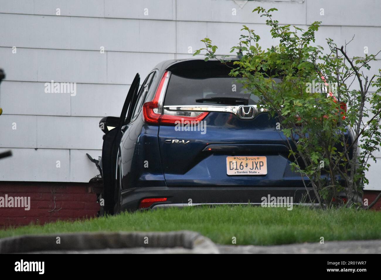 View of a vehicle that struck the house on Hopper Street. A vehicle ...