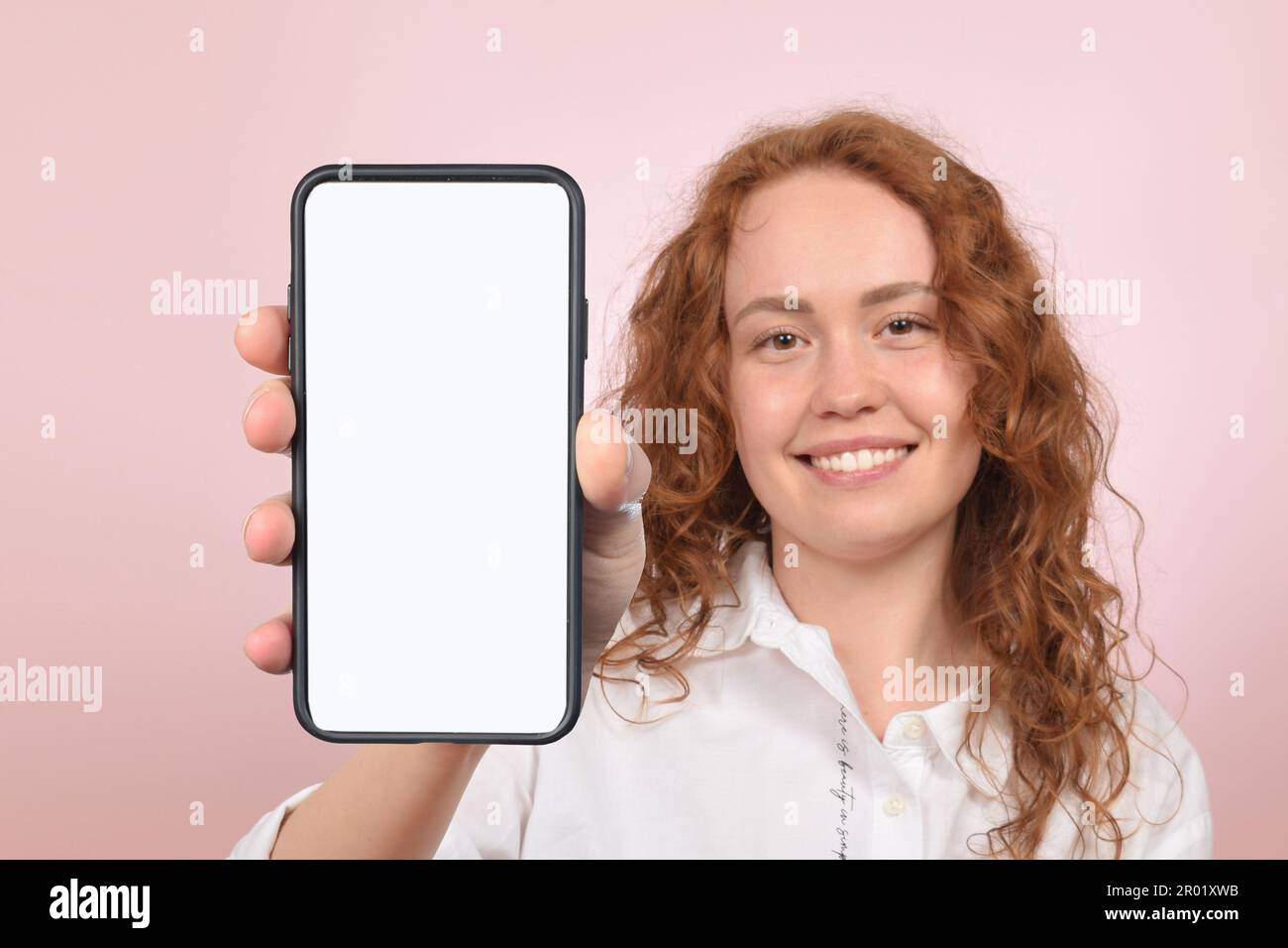 Big mobile phone young hi-res stock photography and images - Alamy