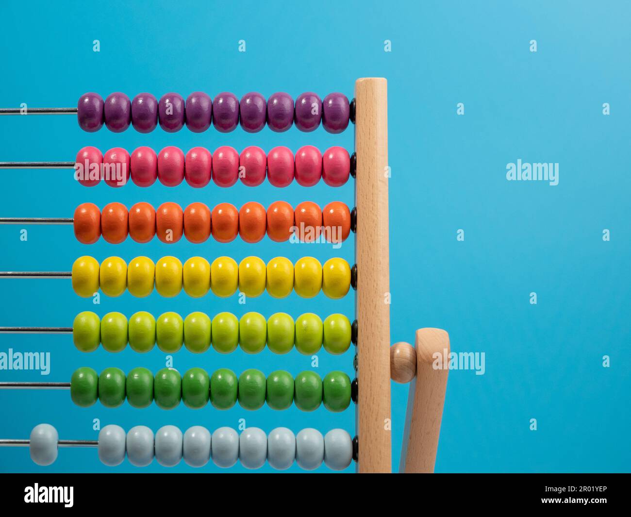 Wooden abacus on a blue background, Wooden abacus for children. Wooden ...