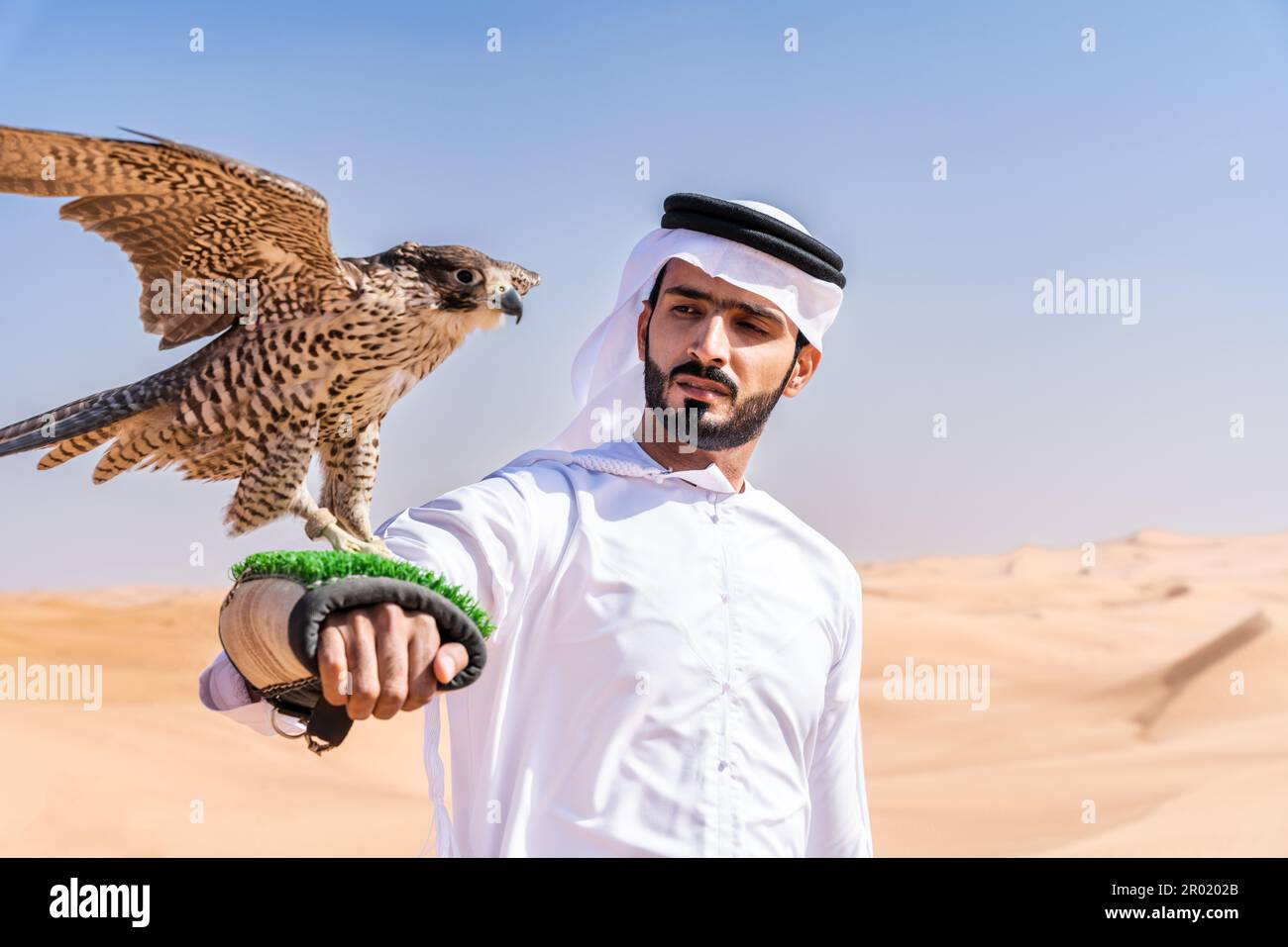 Middle-eastern man wearing traditional emirati arab kandura in the ...