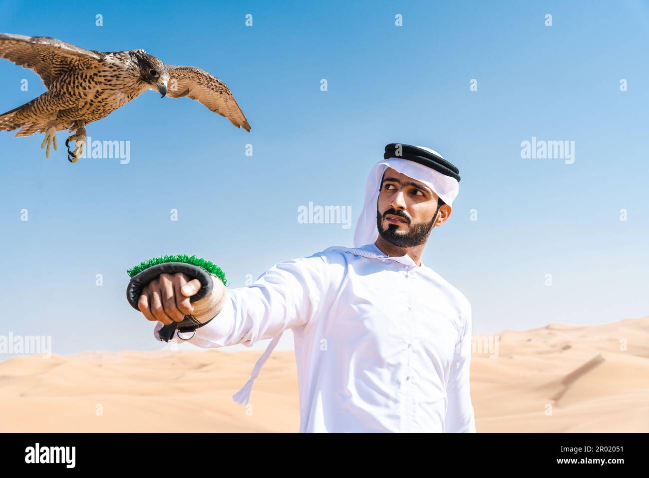 Middle-eastern man wearing traditional emirati arab kandura in the ...