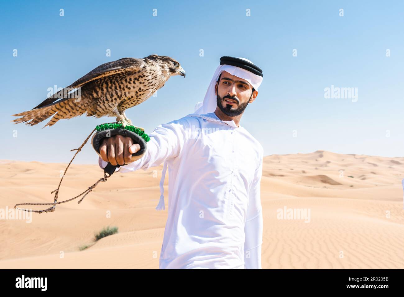 Middle-eastern man wearing traditional emirati arab kandura in the ...