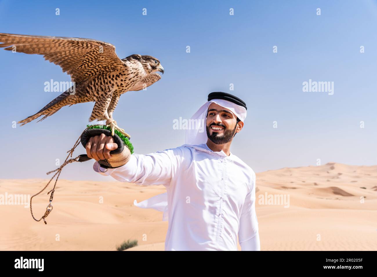 Middle-eastern man wearing traditional emirati arab kandura in the ...