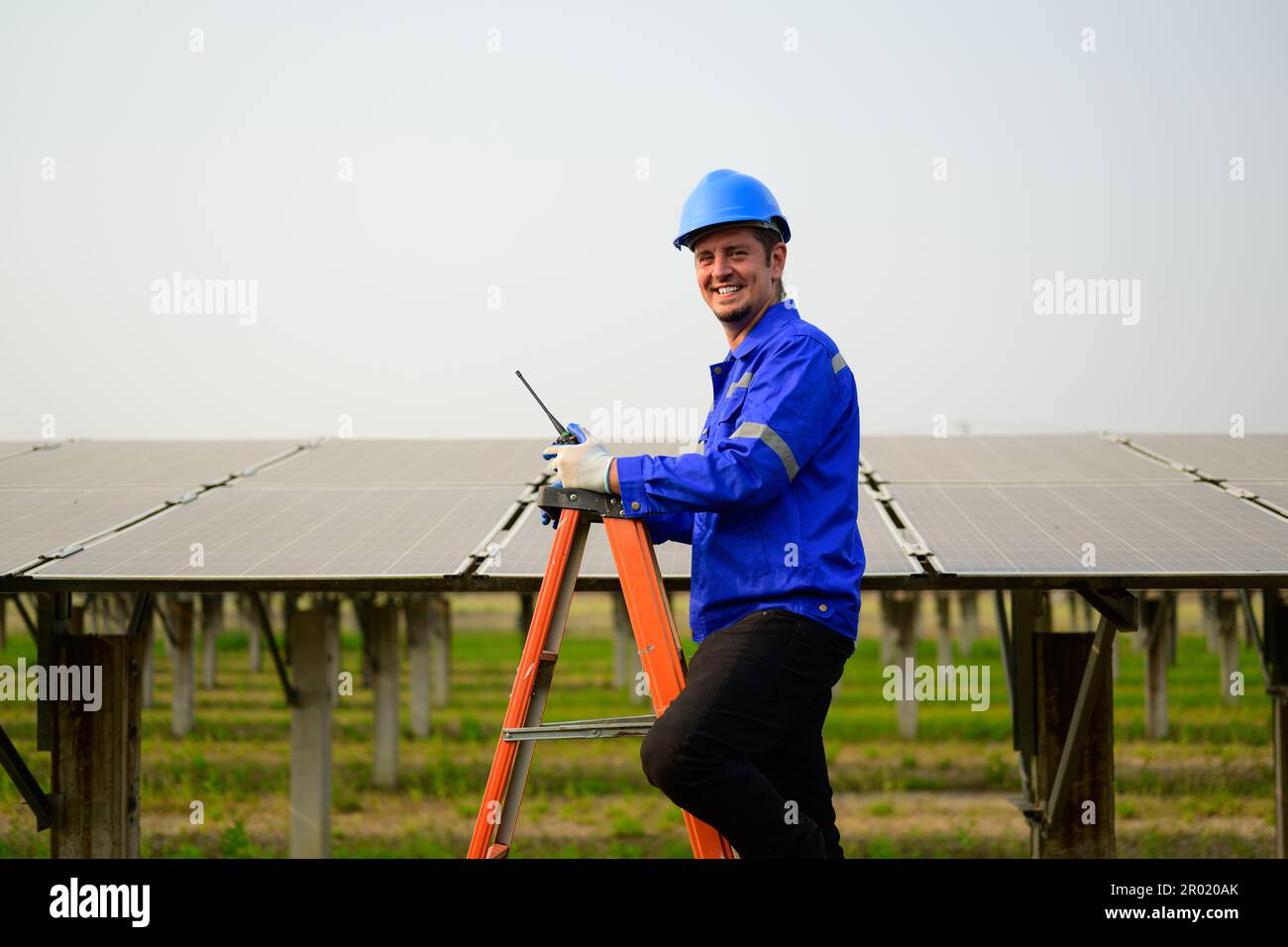 Engineer technician checking solar panels on solar power plant Stock ...