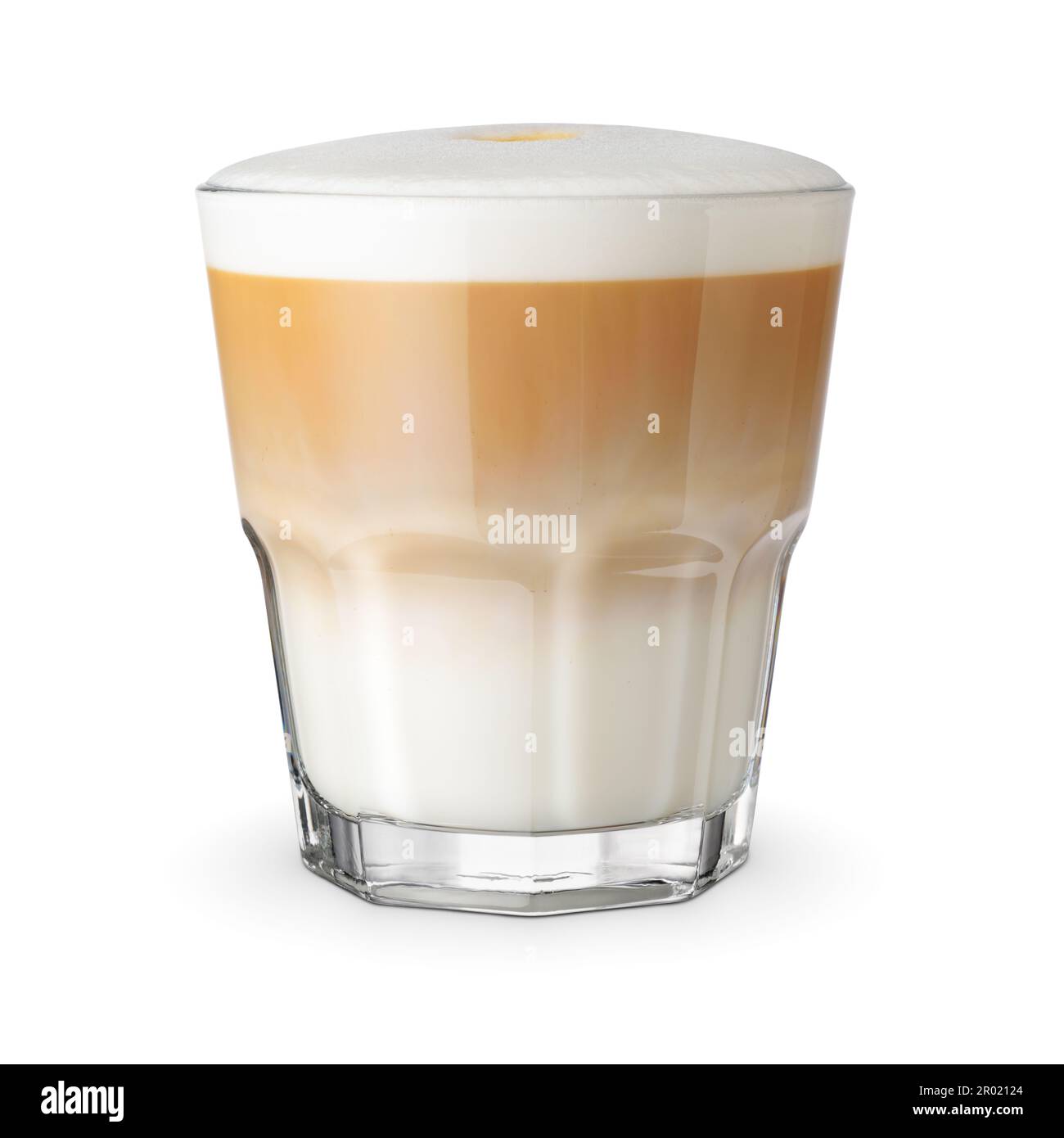 Foamy latte coffee and milk drink in a transparent glass isolated on ...