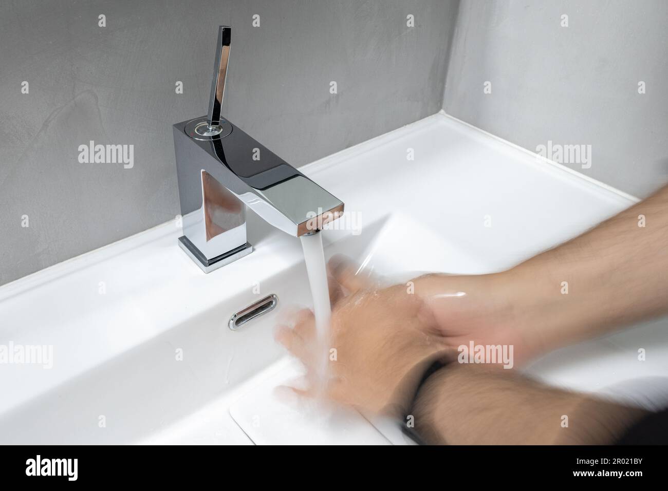 Washing Hands on a modern bathroom. Hygiene concept Stock Photo - Alamy