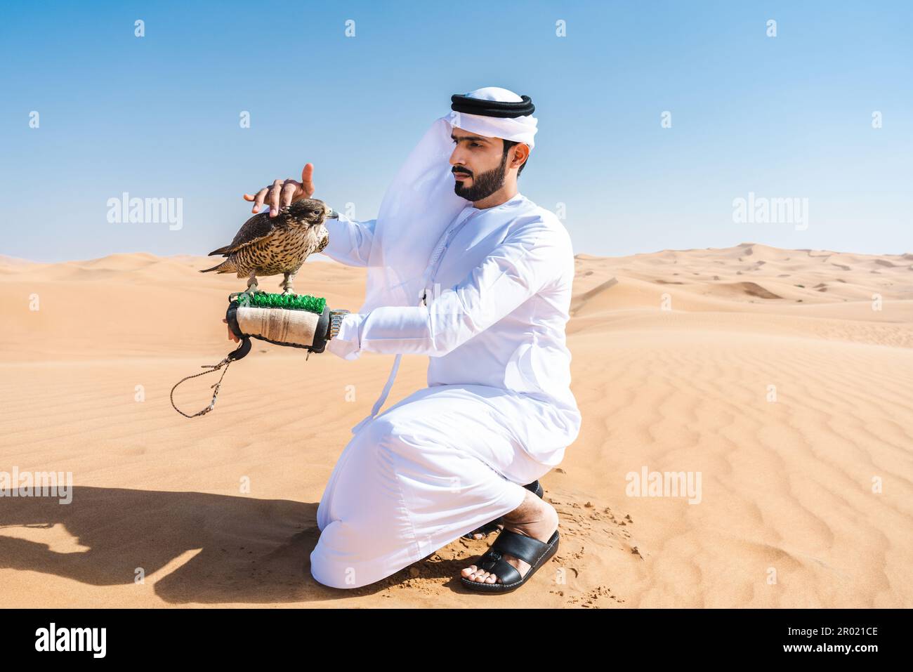 Middle-eastern man wearing traditional emirati arab kandura in the ...