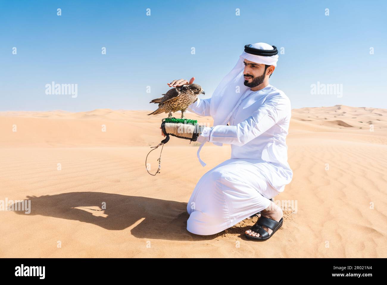 Middle-eastern man wearing traditional emirati arab kandura in the ...