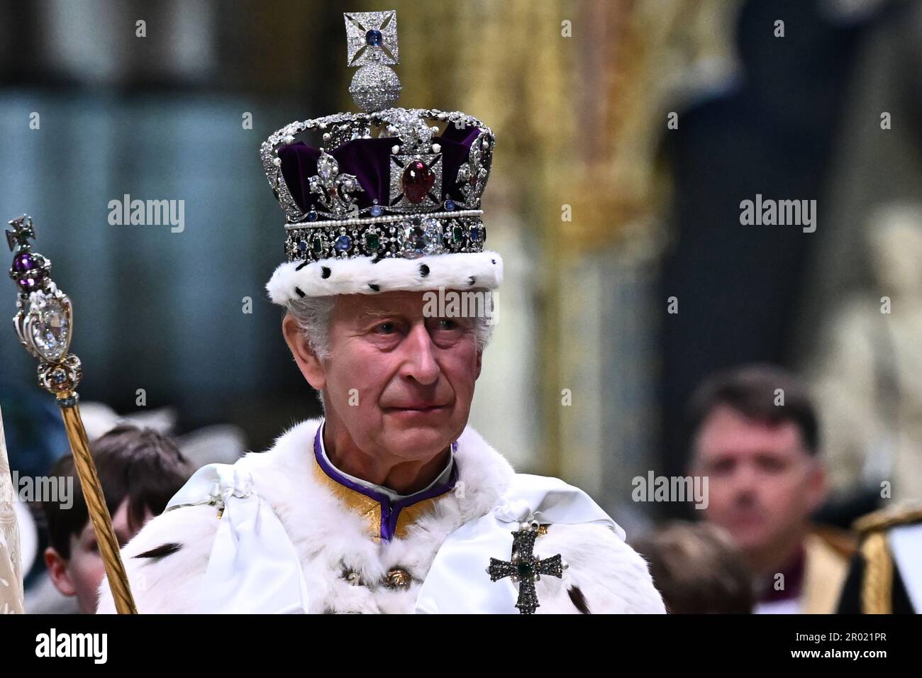 King Charles III wearing the Imperial state Crown carrying the ...