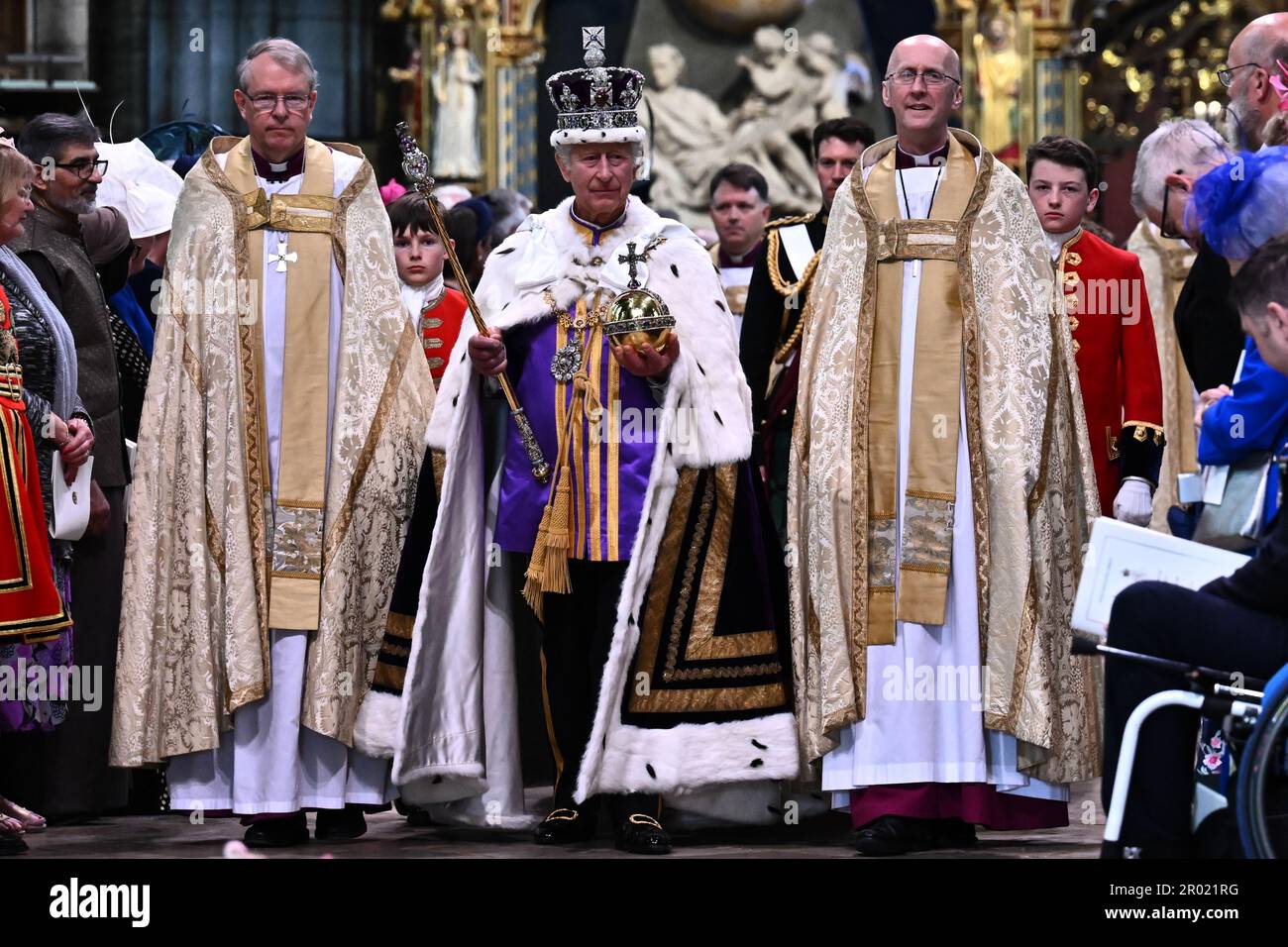 King Charles III wearing the Imperial state Crown carrying the ...