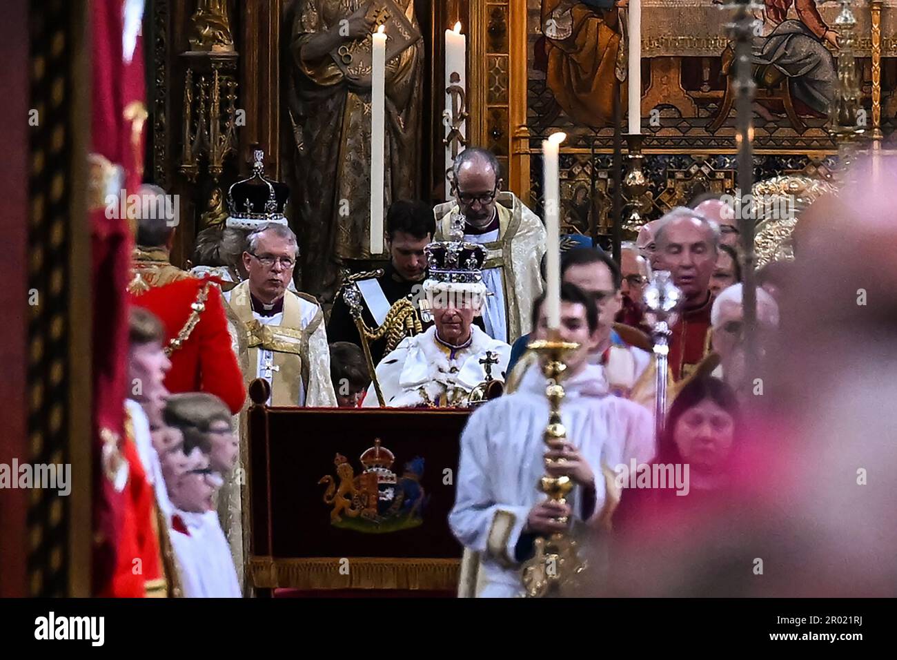 King Charles III wearing the Imperial state Crown carrying the ...